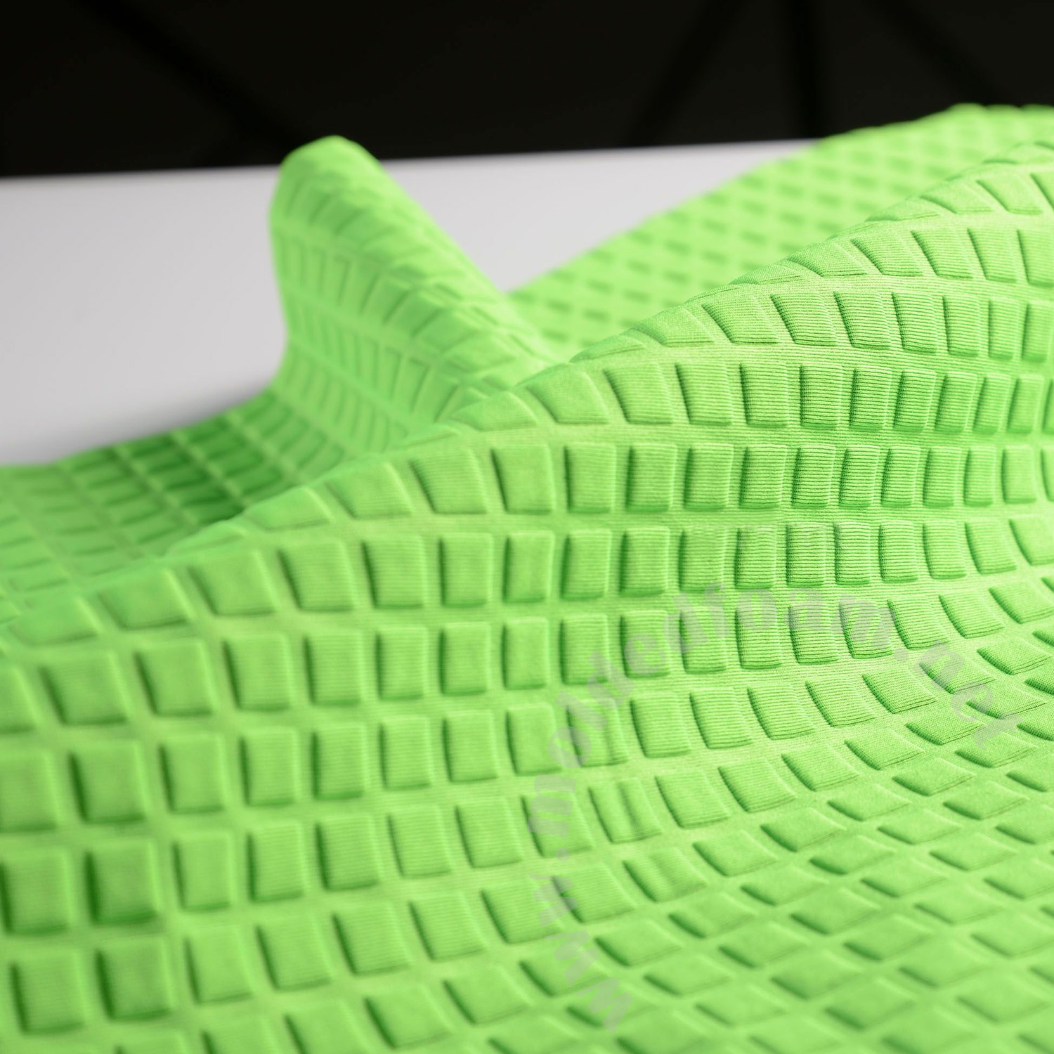 Embossed Neoprene fabric with big square pattern in vivid forest green ...